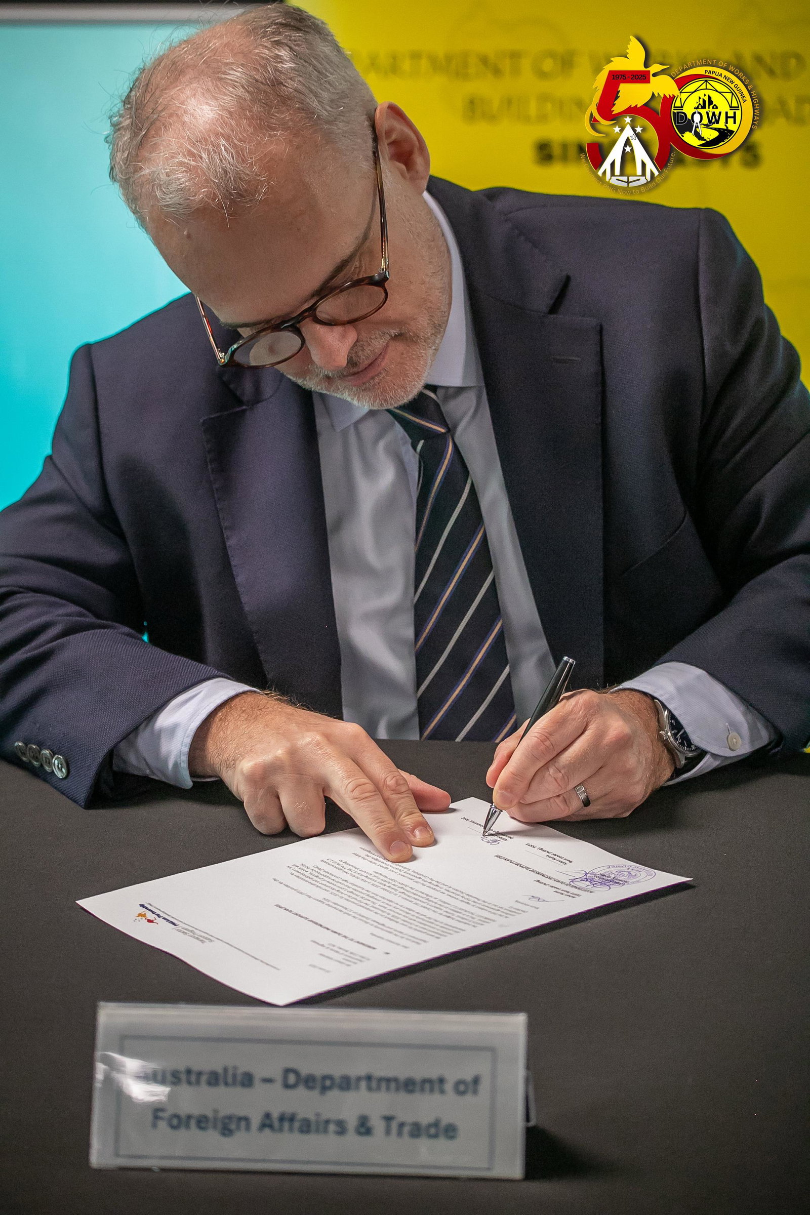 Department of Works & Highways with Department of Transport signed a ...
