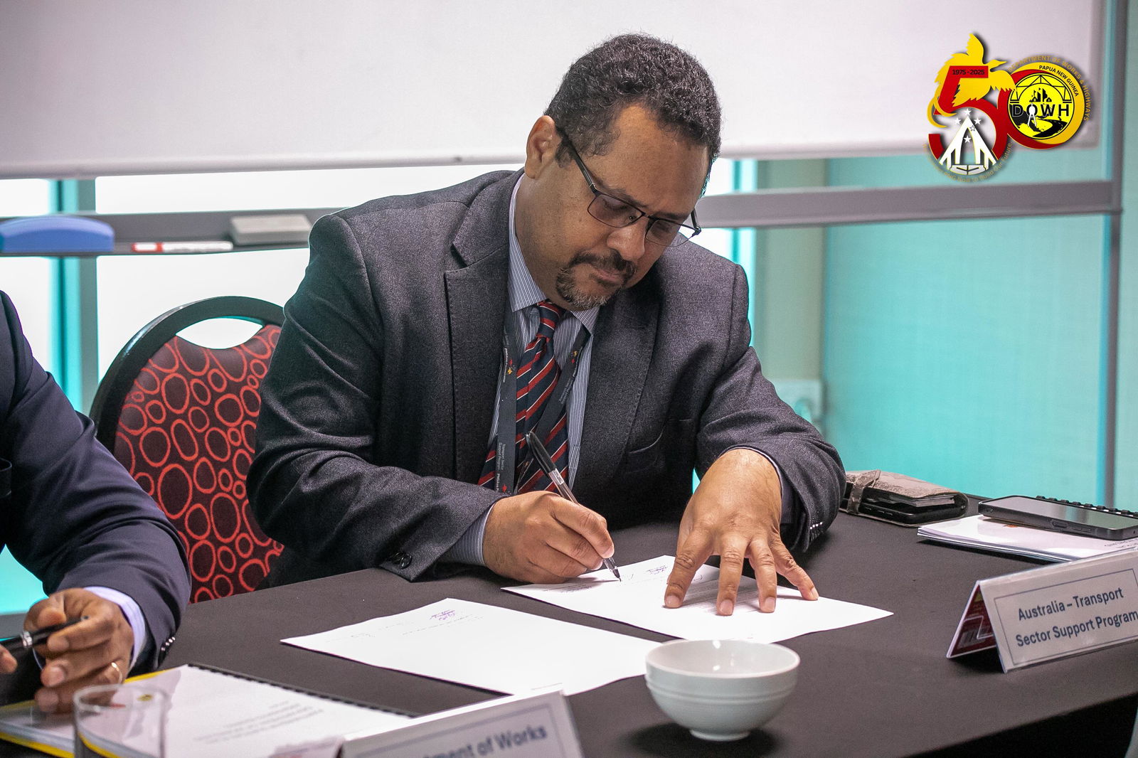 Department of Works & Highways with Department of Transport signed a ...